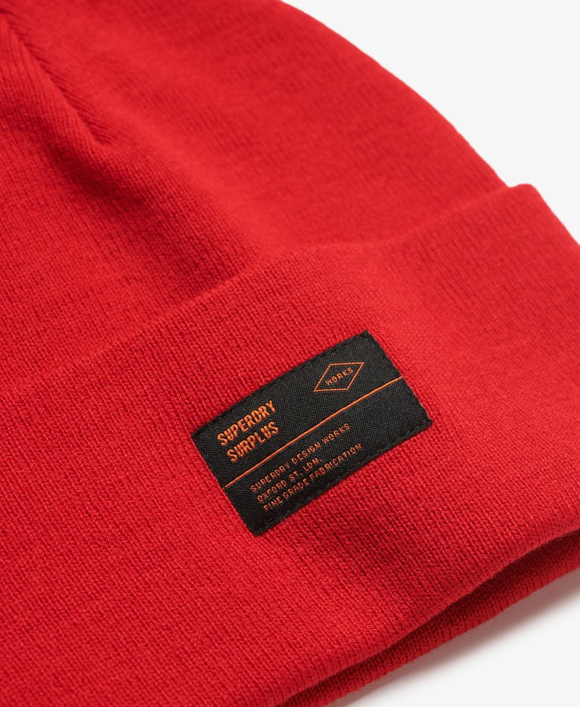 womens Surplus Knitted Beanie Hat in Risk Red | Superdry UK